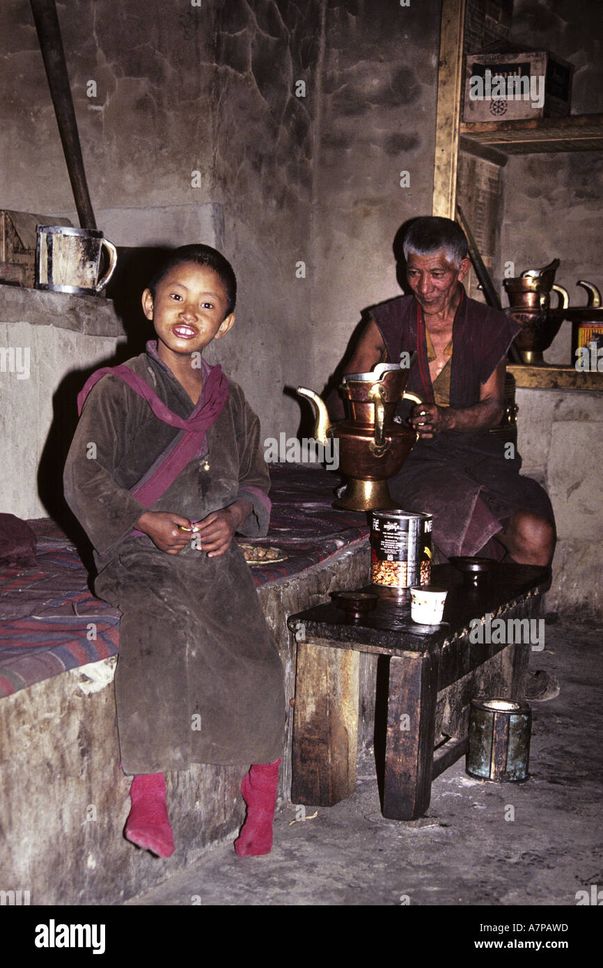 monk and student in the kitchen of Spituk monastery, India, Ladakh ...