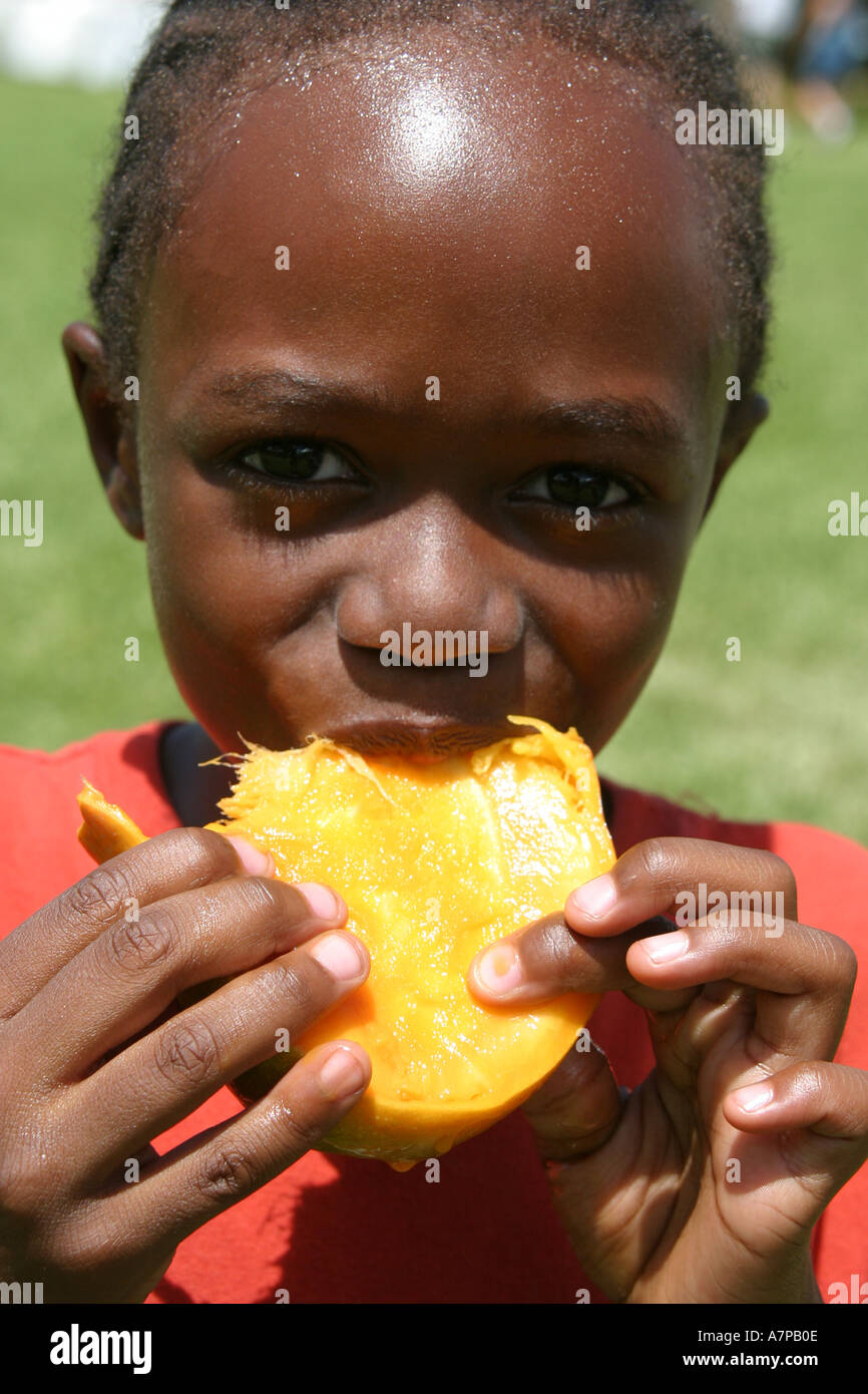 Black Person Eating Fruit