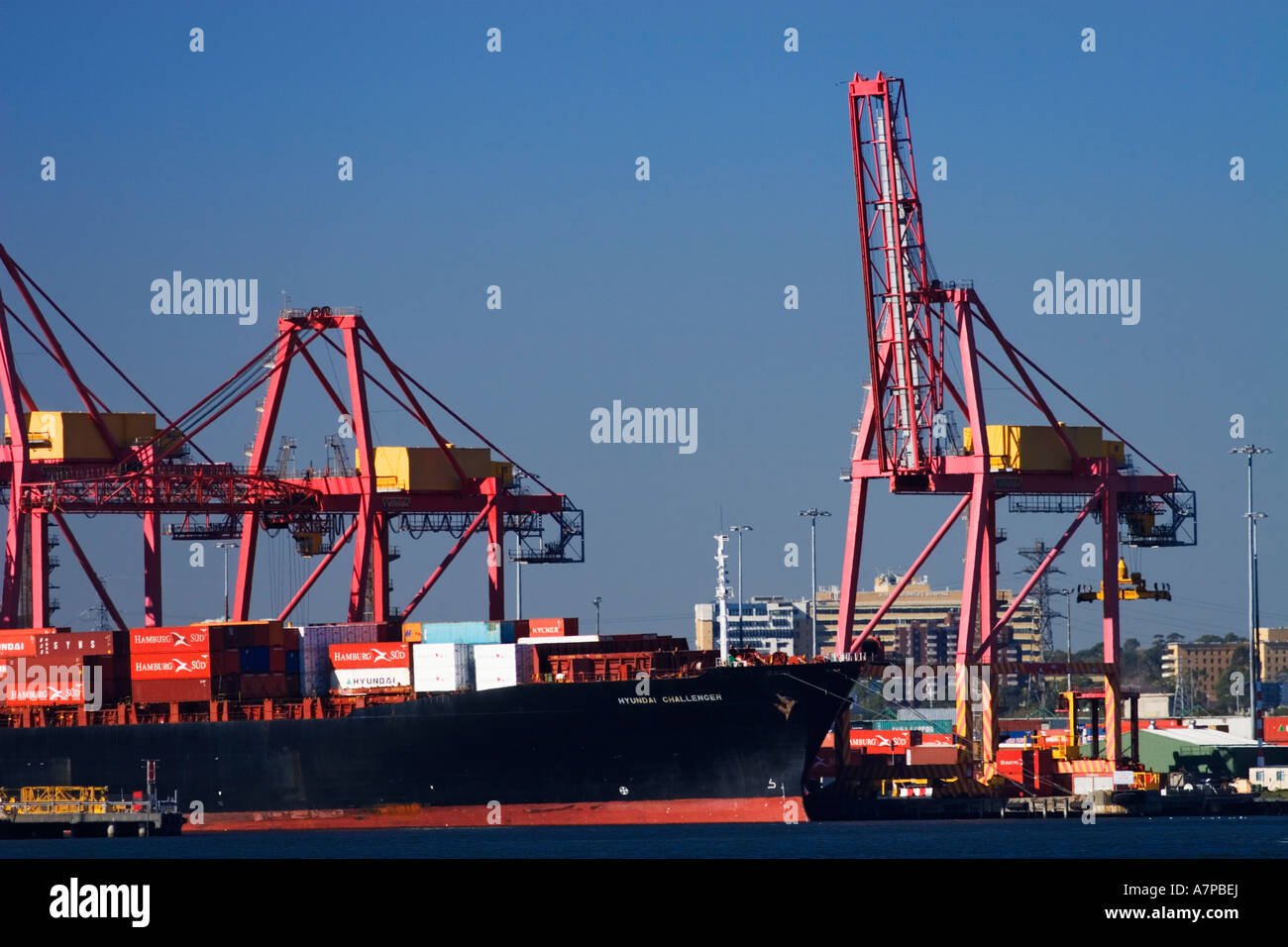 Shipping Industry / A container ship is outbound in the Port of ...
