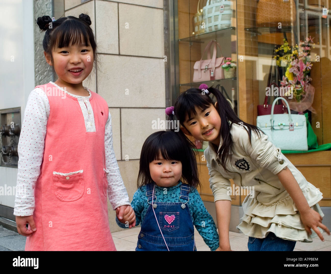 Ginza Tokyo s smartest shopping area girl girls Stock Photo - Alamy