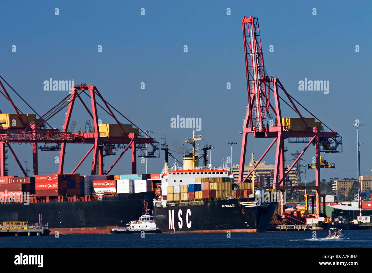 Shipping Industry / A container ship is outbound in the Port of ...