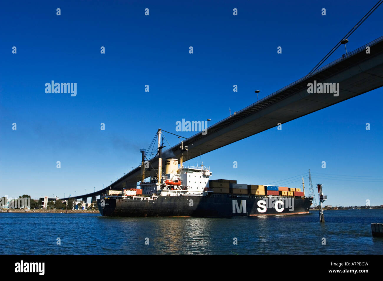 Shipping Industry / A container ship is outbound in the Port of ...