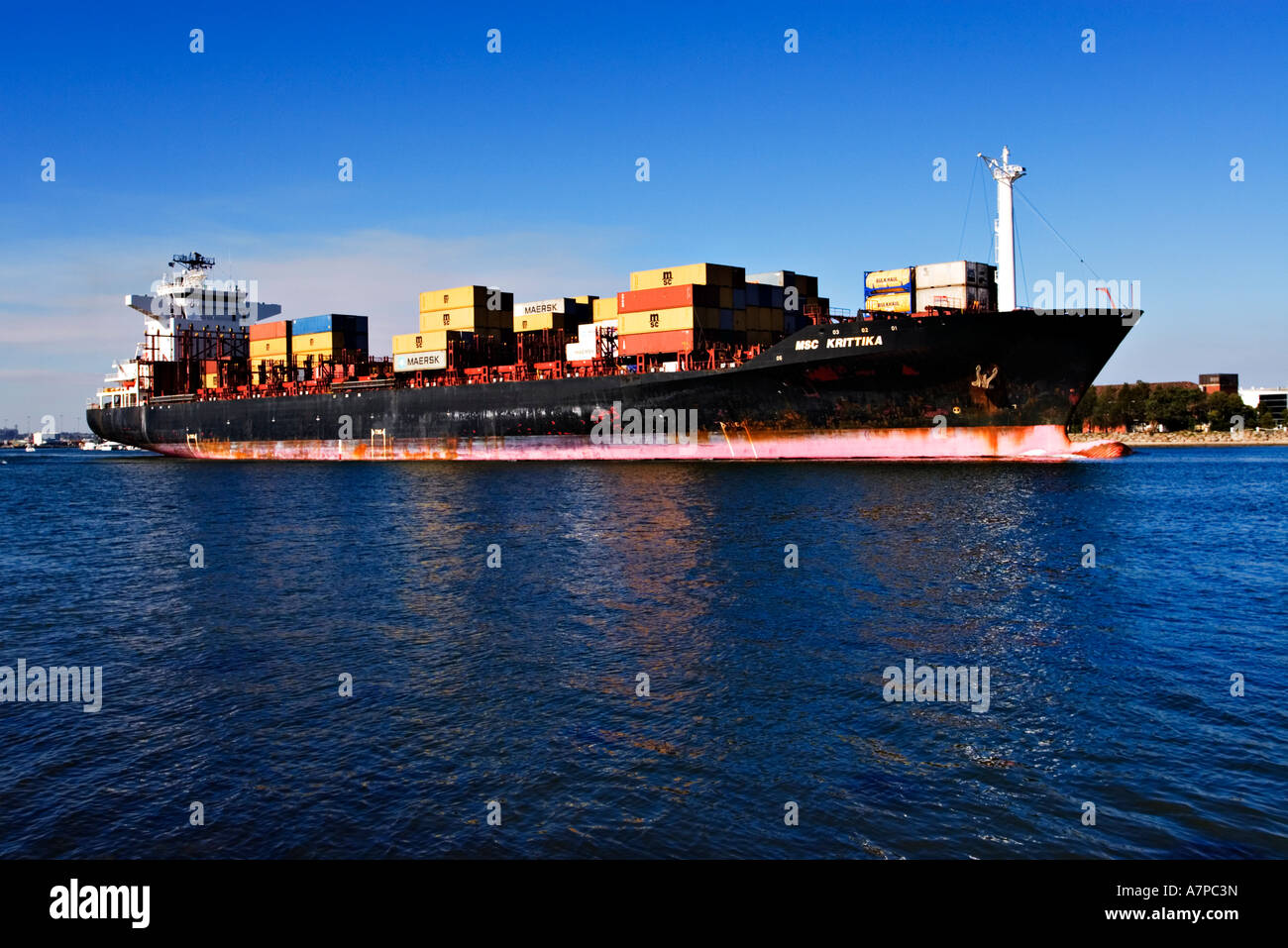 Shipping Industry / A container ship is outbound in the Port of ...