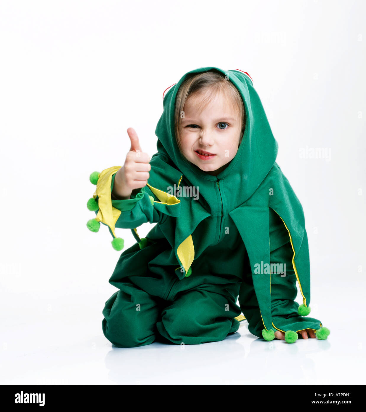 indoor studio girl child kid 5 10 smile smiling blink sit crouch ...