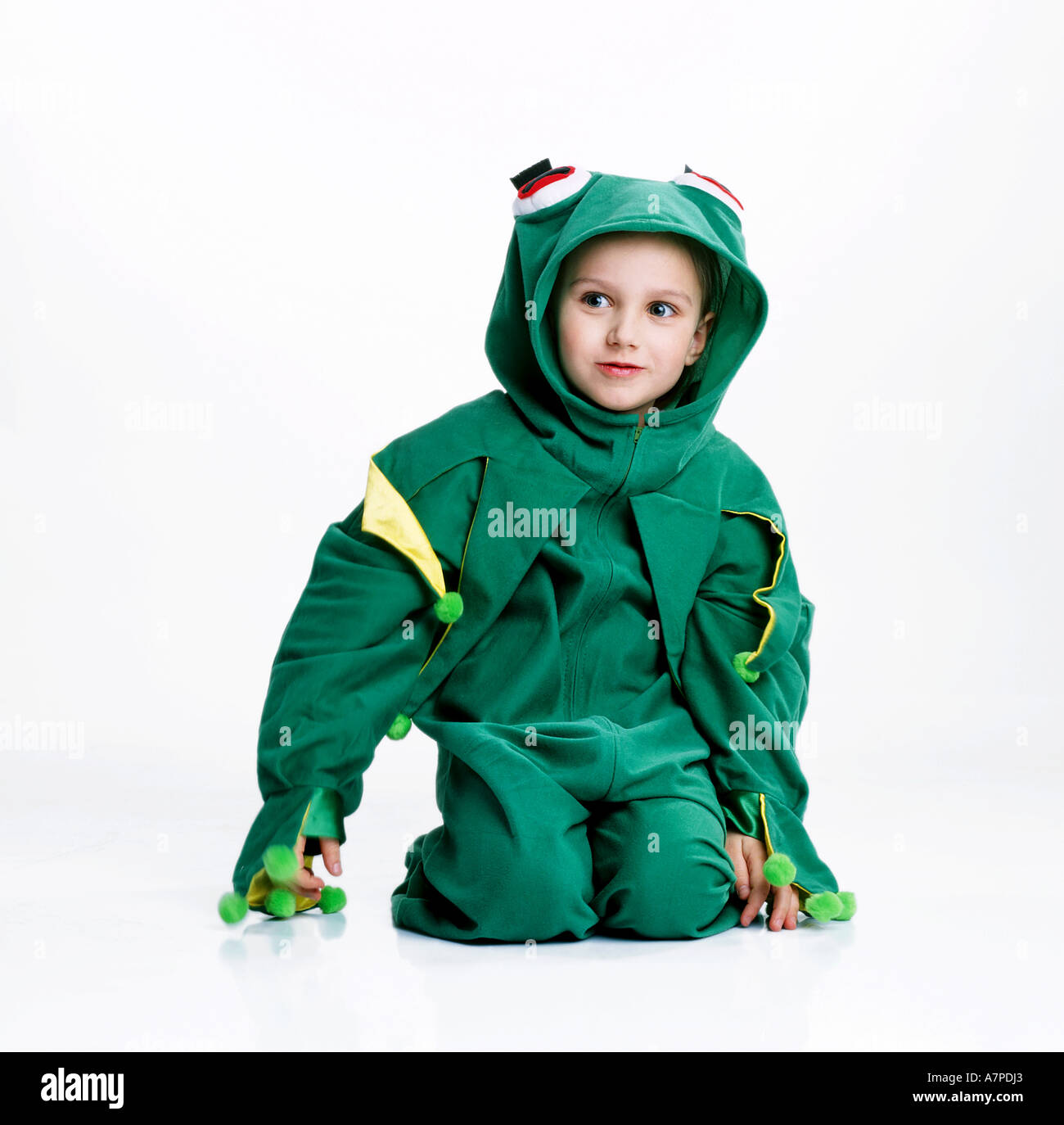 indoor studio girl child kid 5 10 smile smiling sit crouch dress ...