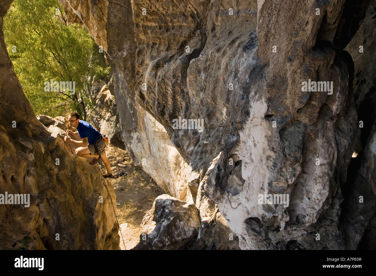 Climbing on limestone stalactites and tufa at Crazy Horse climbing crag ...
