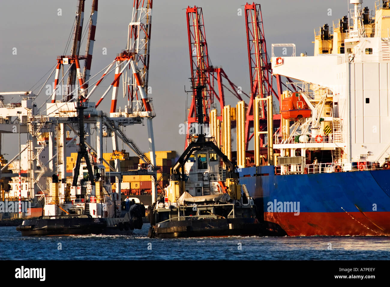 Shipping Industry / A Container Ship proceeds towards the Docks.Port of ...