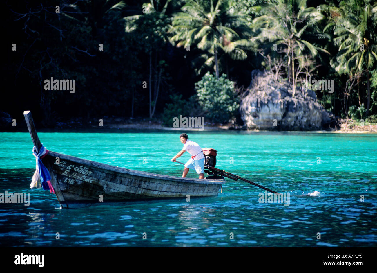 Thailand, South, a long tail boat in Pee-Pee island clear waters Stock ...