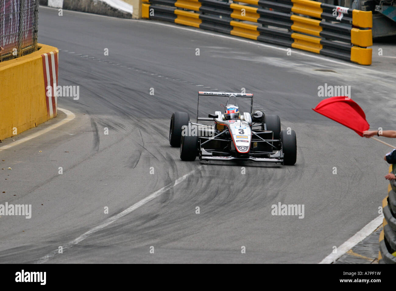 Formula 3 Car in Macau Grand Prix being shown red flag Stock Photo - Alamy