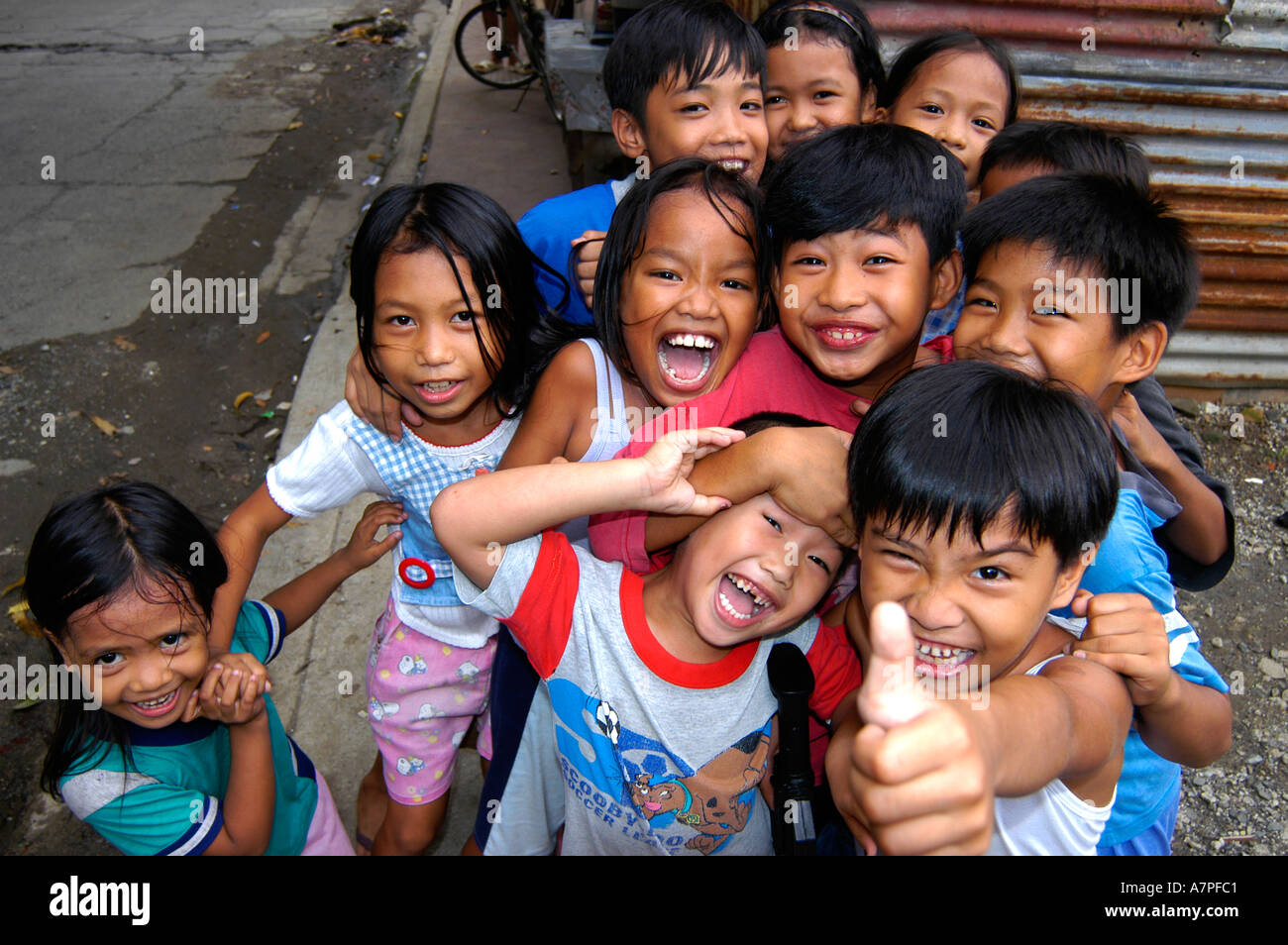 Children playing in street Stock Photo - Alamy