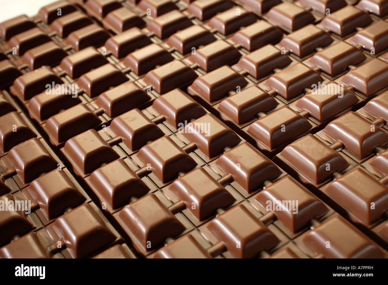 Milk chocolate bars, full frame Stock Photo - Alamy