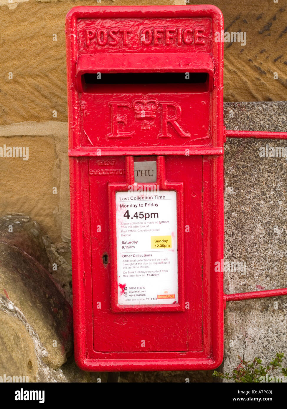 Small wall mounted post box in Upleatham Cleveland UK Stock Photo - Alamy