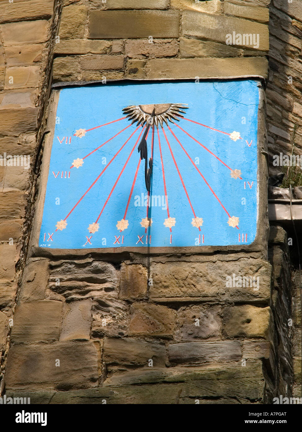 Sundial showing time 12 20 GMT Durham Cathedral Stock Photo - Alamy