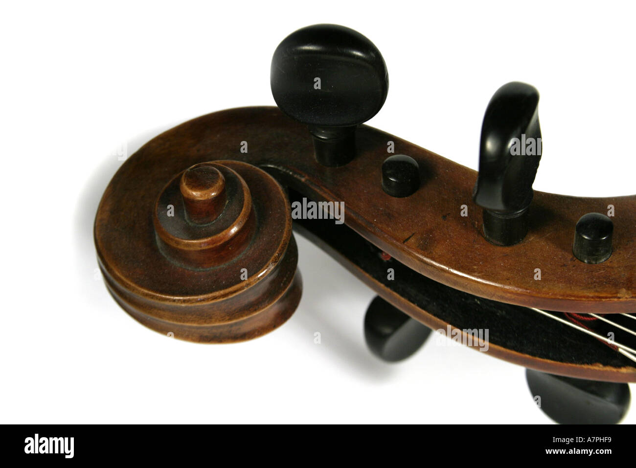The scroll of a cello isolated on white with clipping path Stock Photo ...