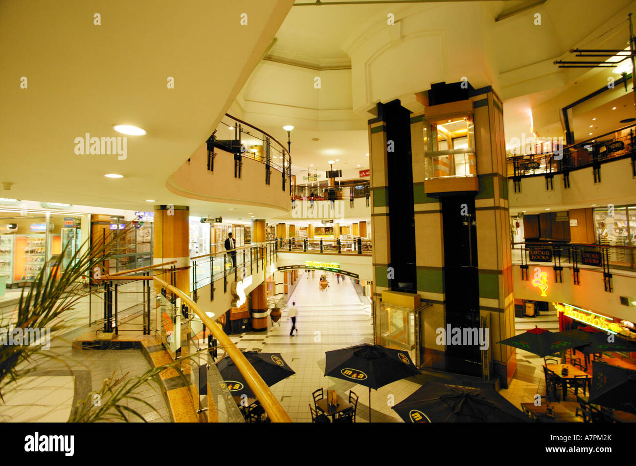 Shopping mall interior in Sandton showing a restaurant area and an open ...