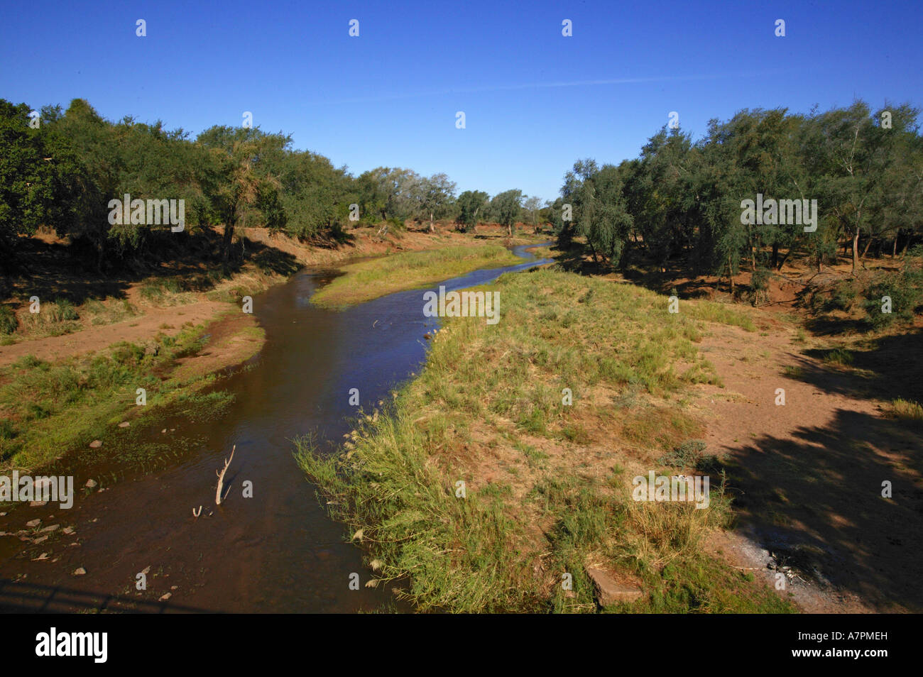 The tree lined Luvuvhu River in the northern Kruger National Park ...