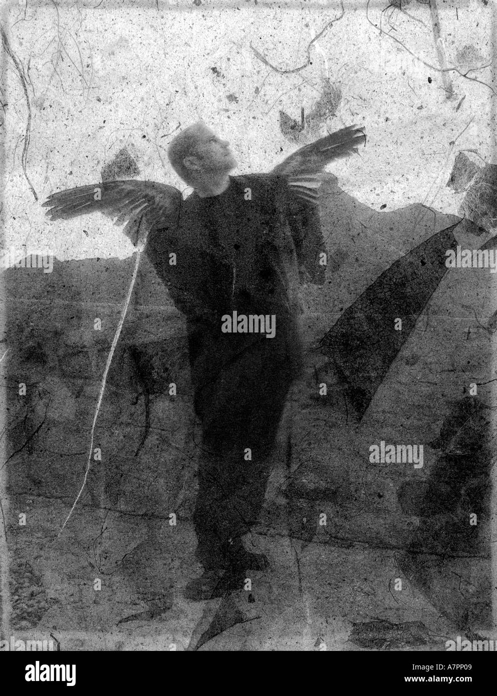 Upward Looking Fallen Angel A fallen angel holding his broken wings up ...