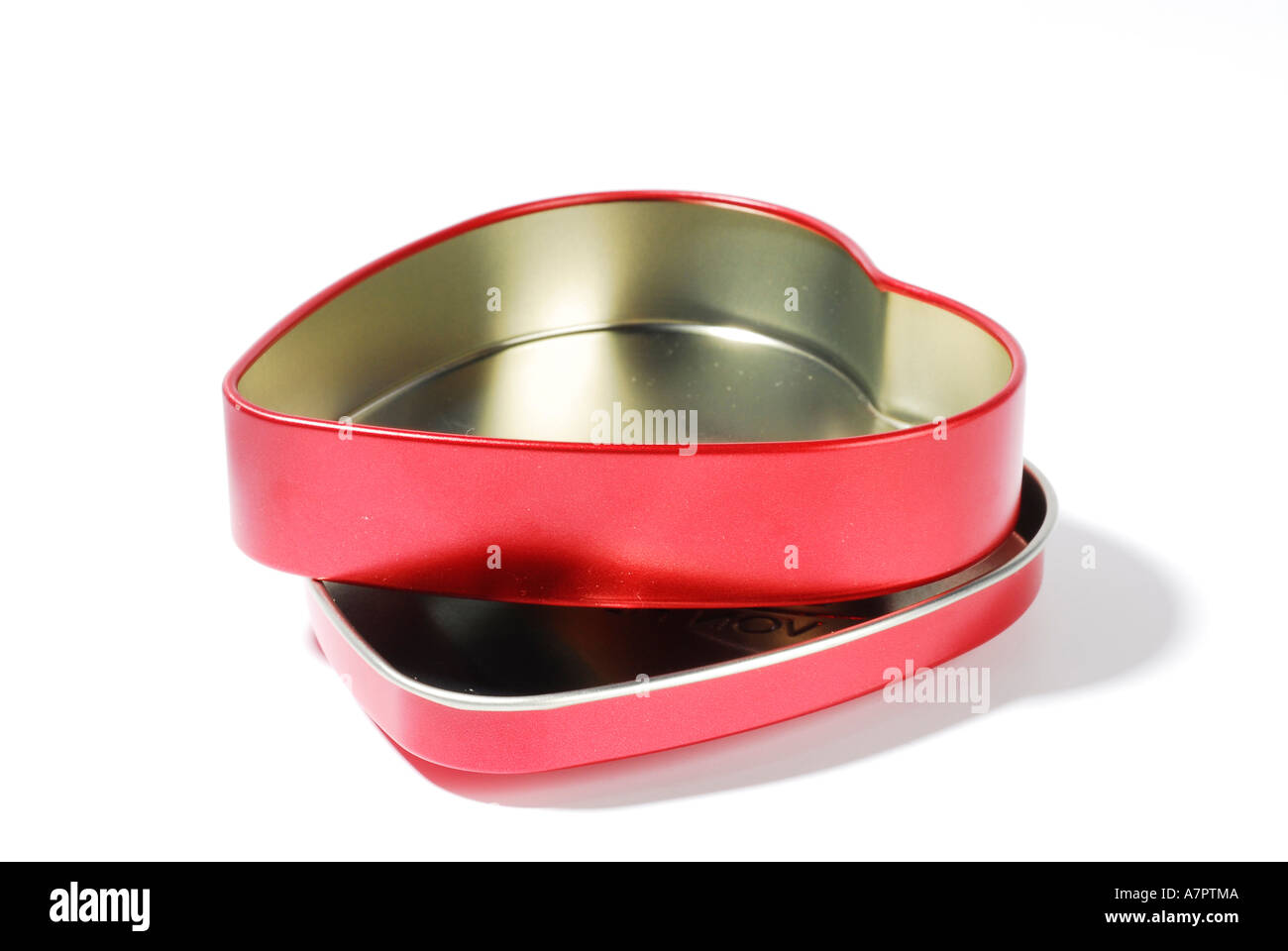 Tin can in heart form Stock Photo - Alamy