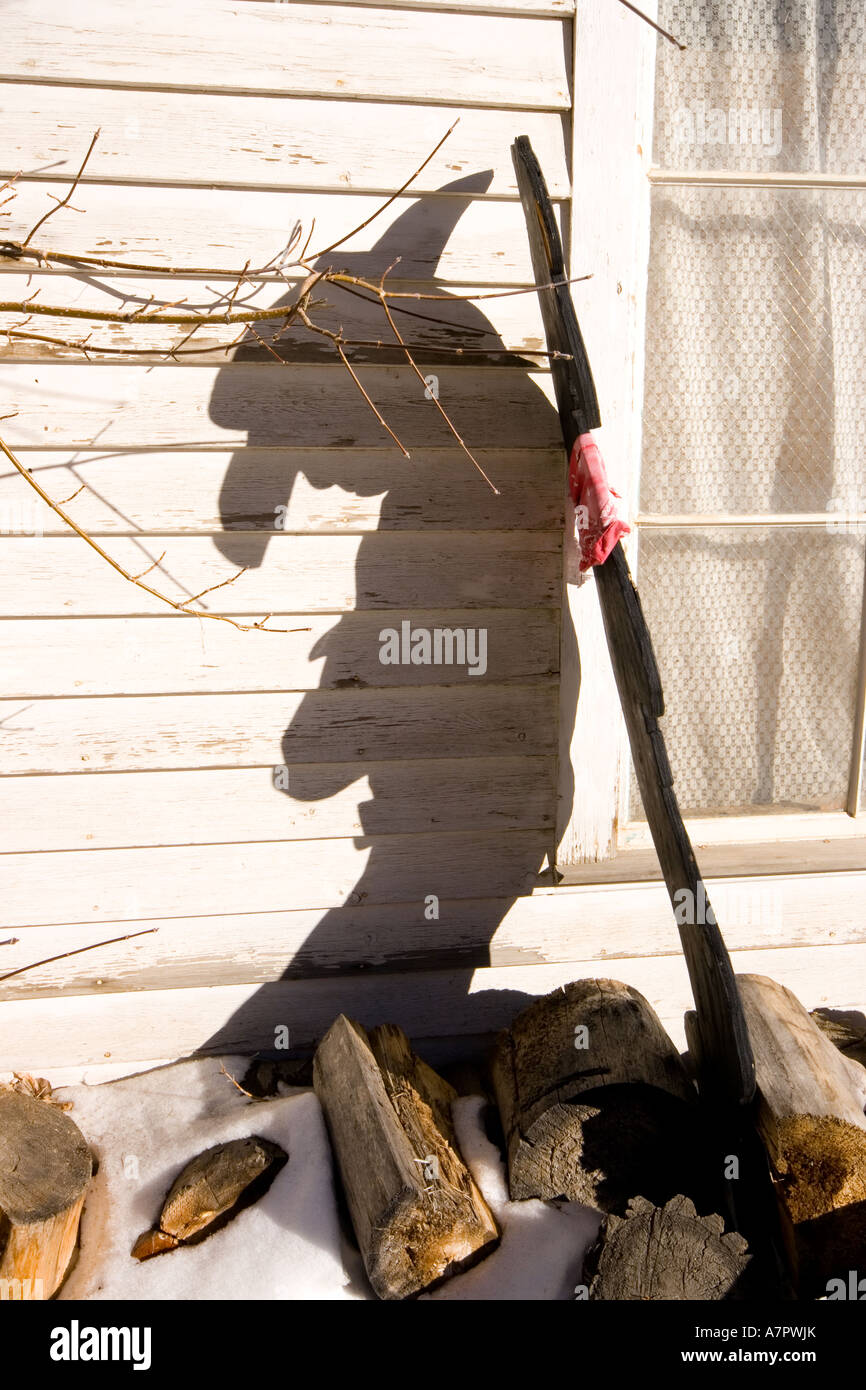 Shadow of cut out cowboy against white painted wall Stock Photo - Alamy