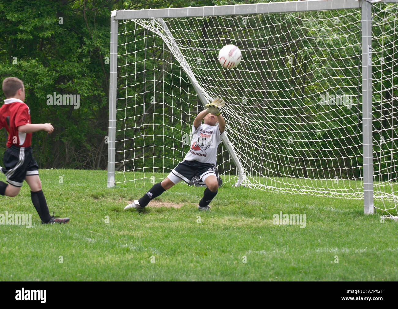 Child soccer goalie african hi-res stock photography and images - Alamy