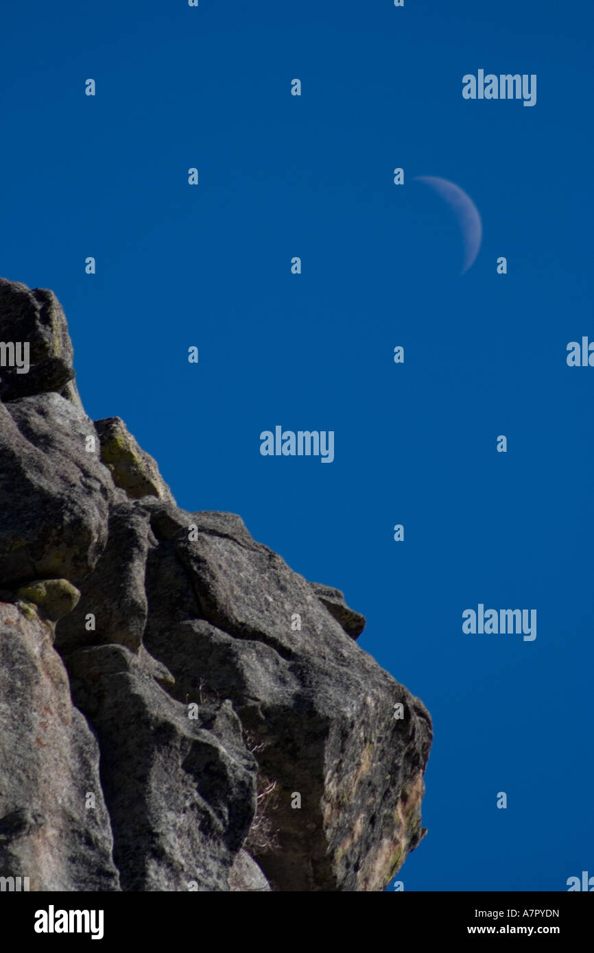 Blue sky and moon with rocks in Colorado USA on vacation holiday trip ...