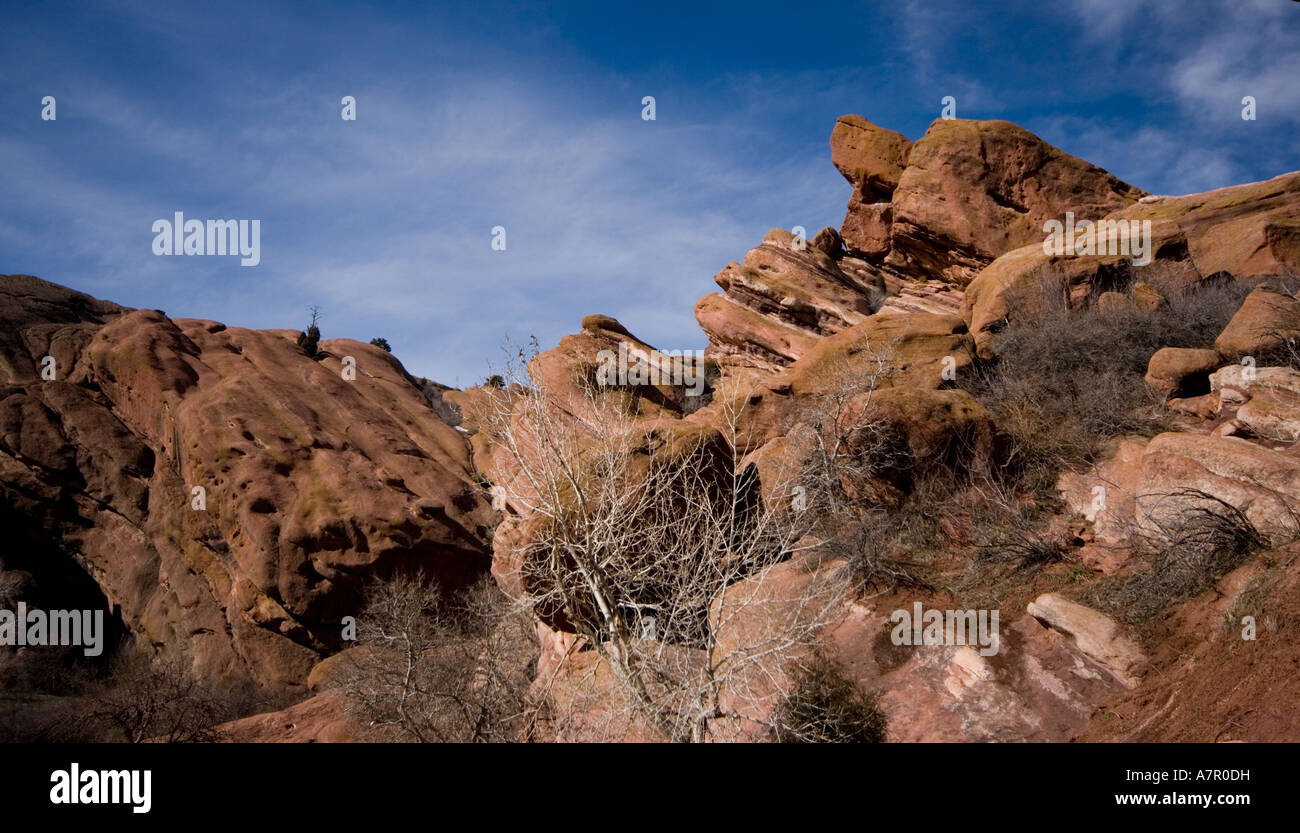 Red Rocks Colorado on a sunny day with a blue sky and puffy white ...