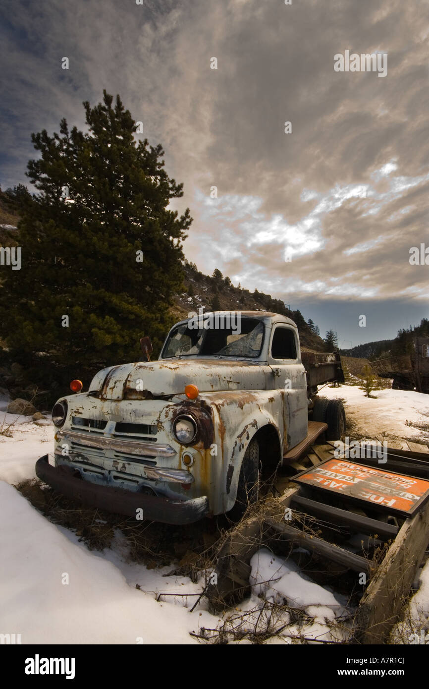 Rusty old car in open air in Colorado USA in snow and ice. Broken old ...