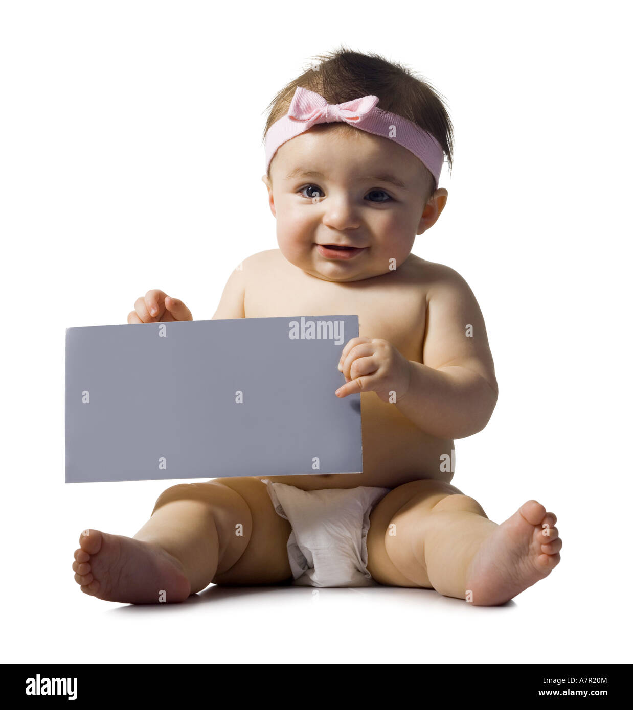 Baby girl with blank sign Stock Photo - Alamy