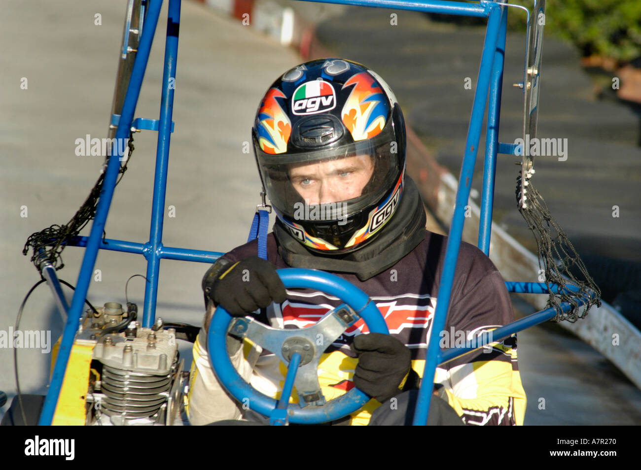 Kids and Dads racing small carts Stock Photo - Alamy