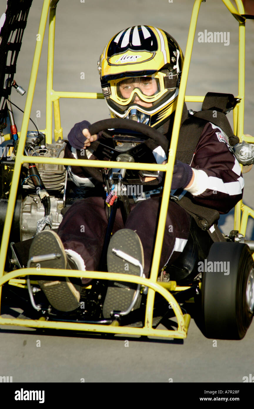 Kids and Dads racing small carts Stock Photo - Alamy