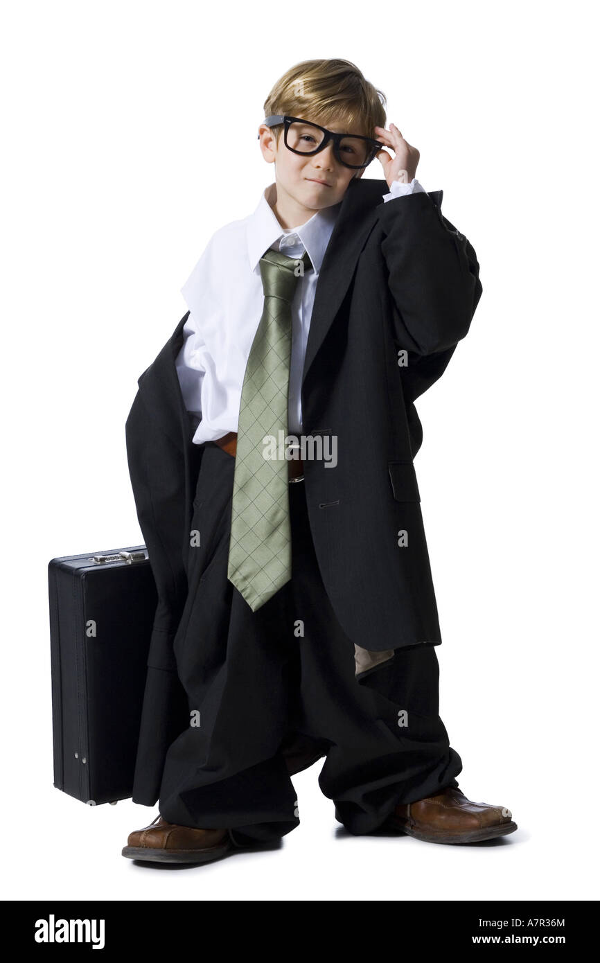 Little boy dressed as business executive Stock Photo - Alamy