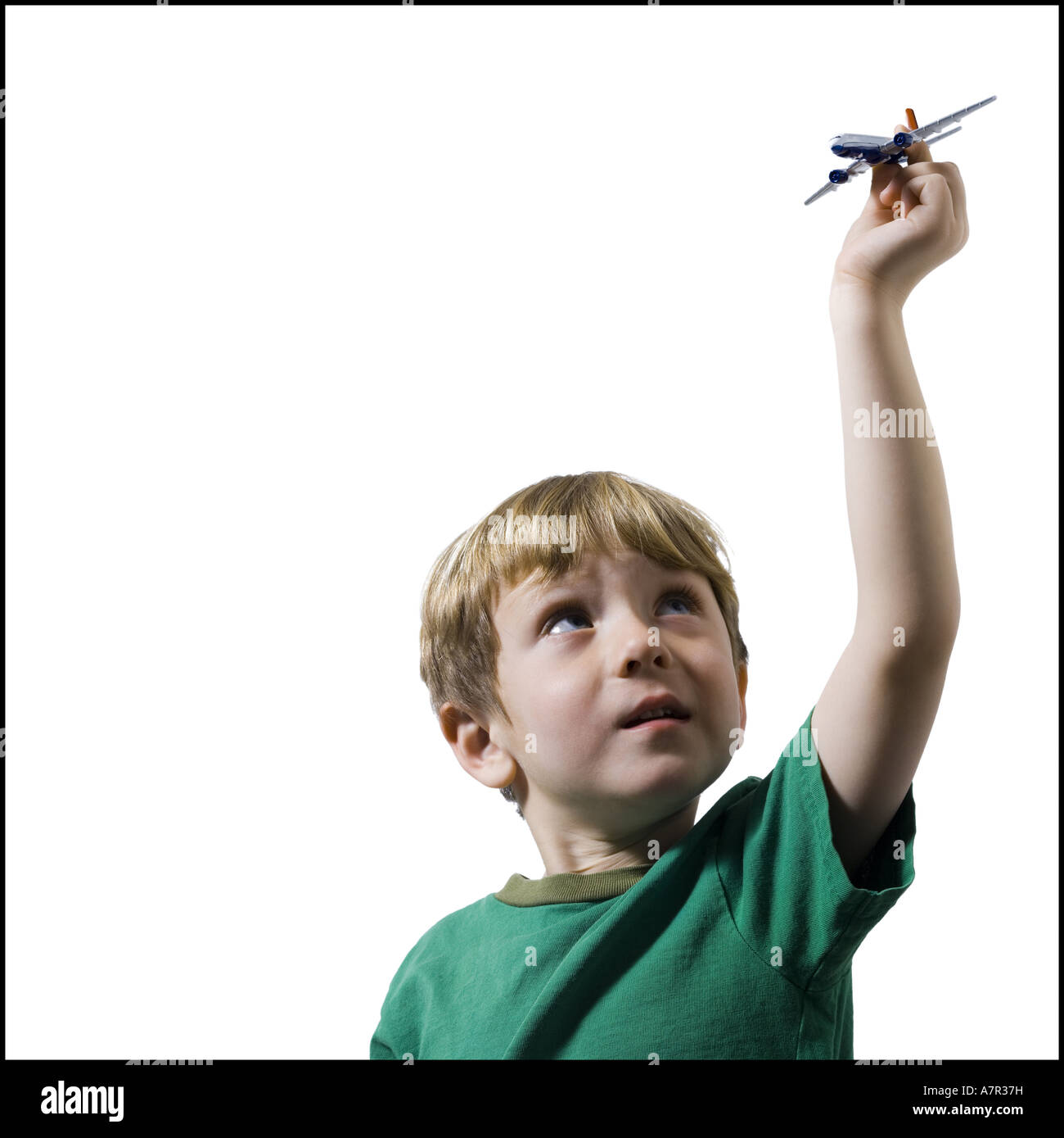 Boy holding toy airplane Stock Photo - Alamy