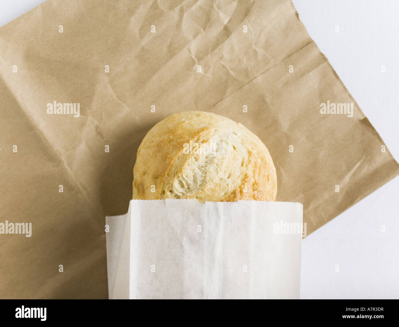 Loaf of bread in paper bag Stock Photo - Alamy