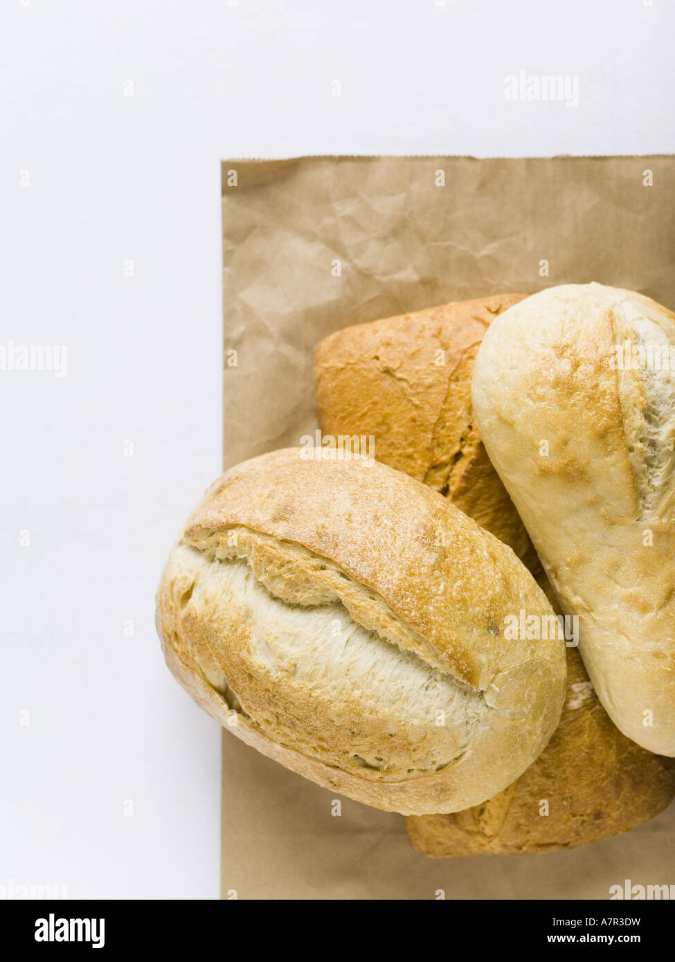 Buns on paper bag Stock Photo - Alamy