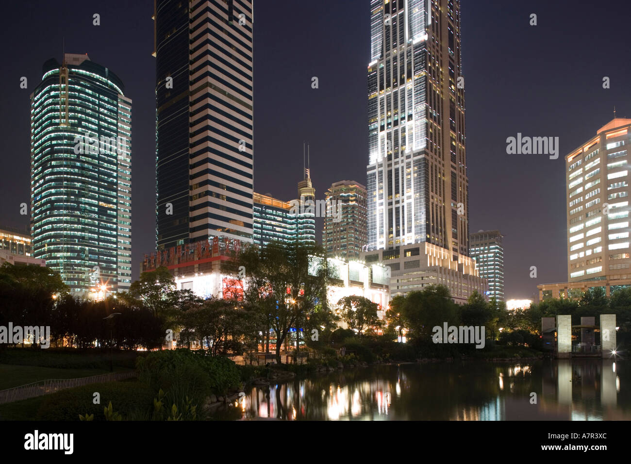 Asia China Shanghai High rise office towers at dusk on summer evening ...