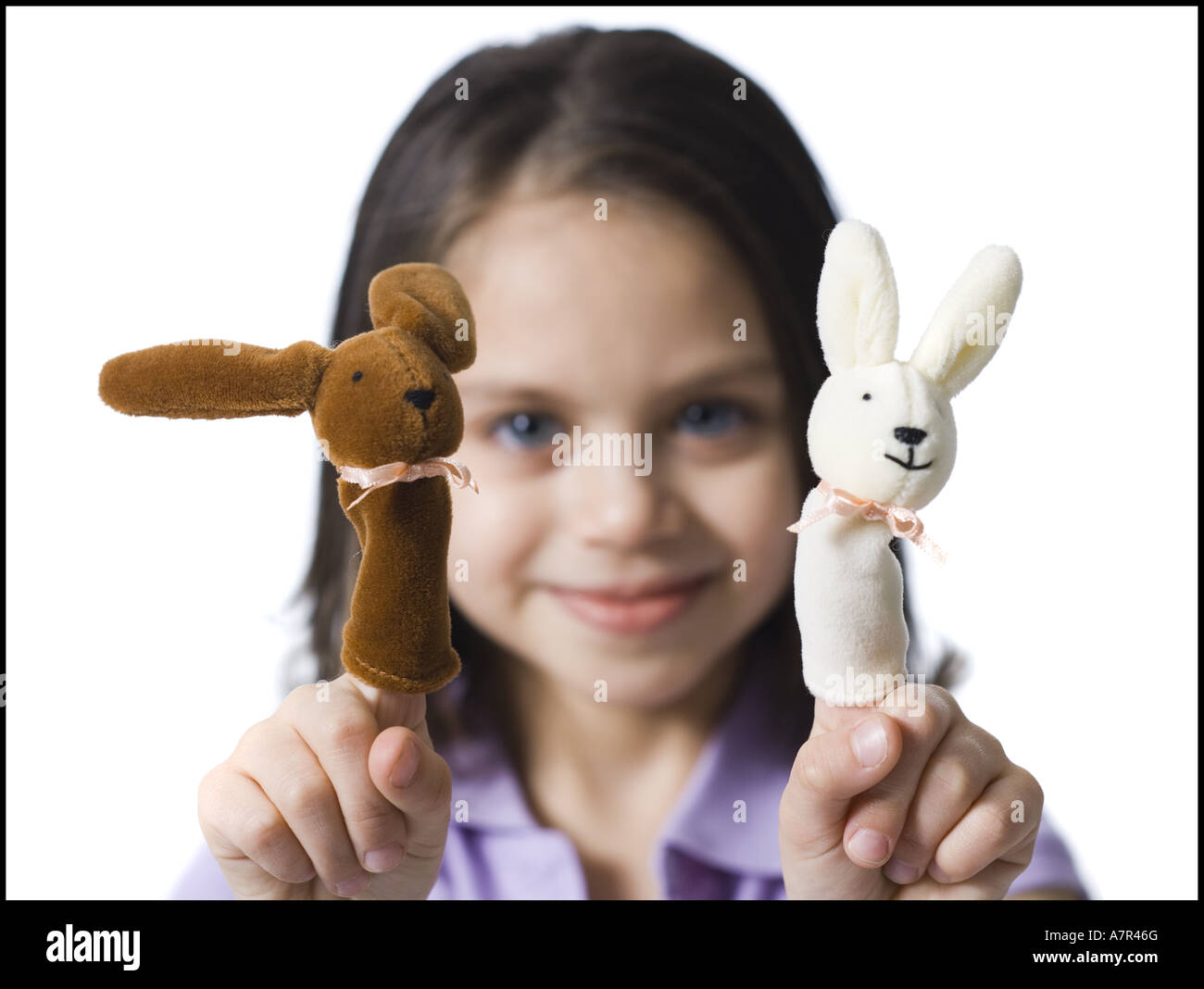 Girl with finger puppets Stock Photo - Alamy