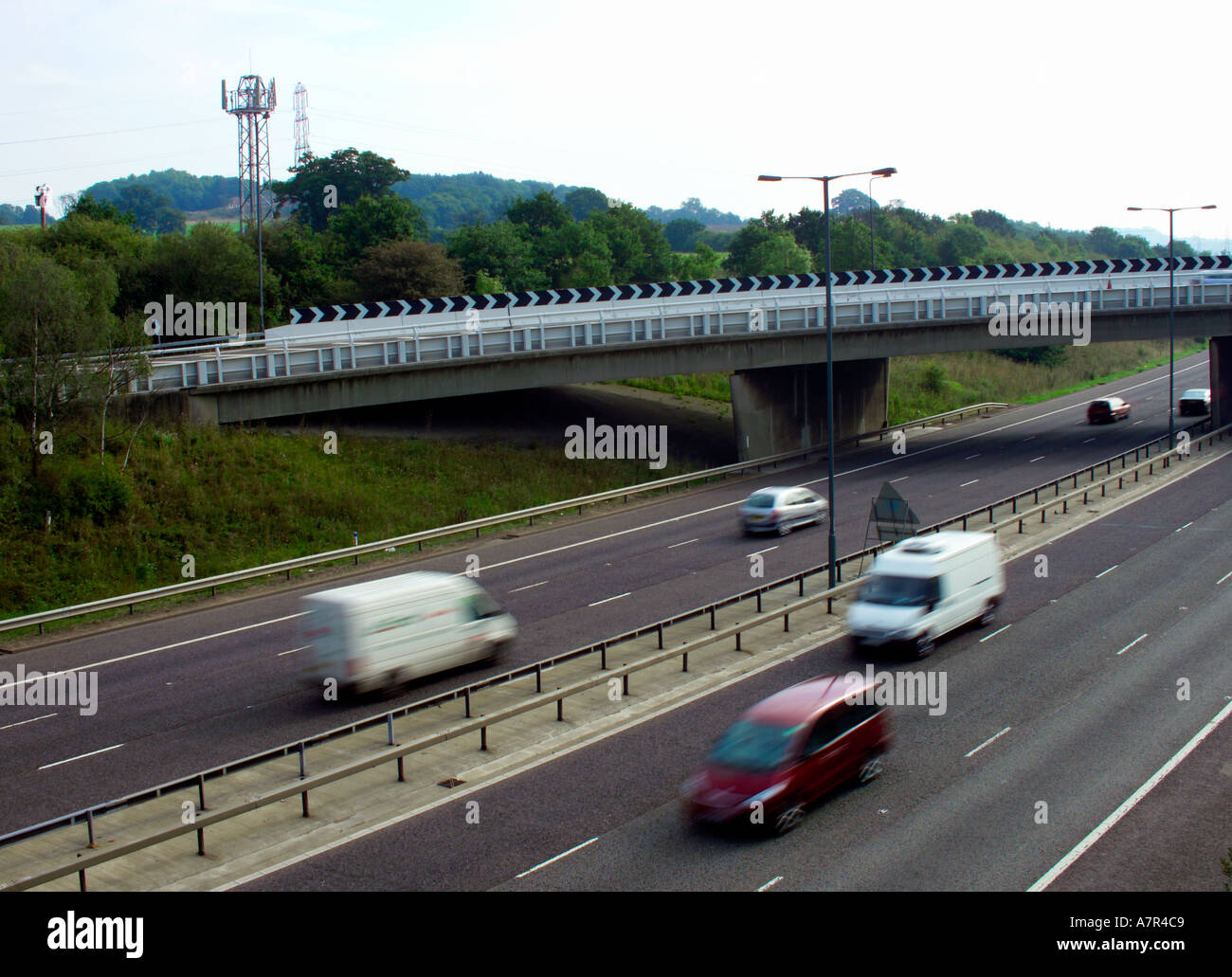telecommunications mast on side of busy motorway Stock Photo - Alamy