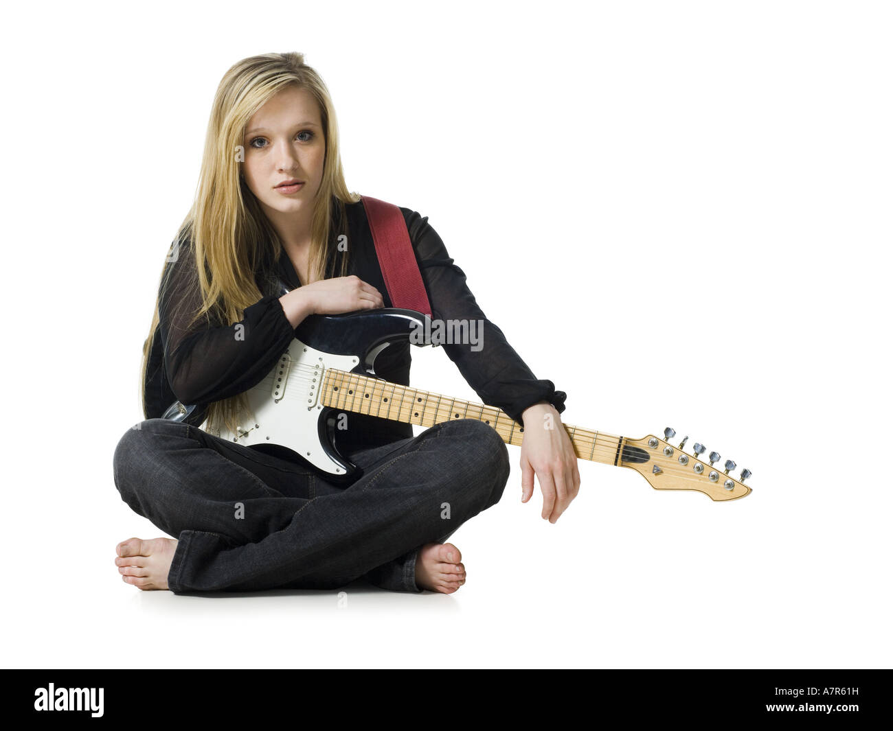 Guitarist sitting crossed legs hi-res stock photography and images - Alamy
