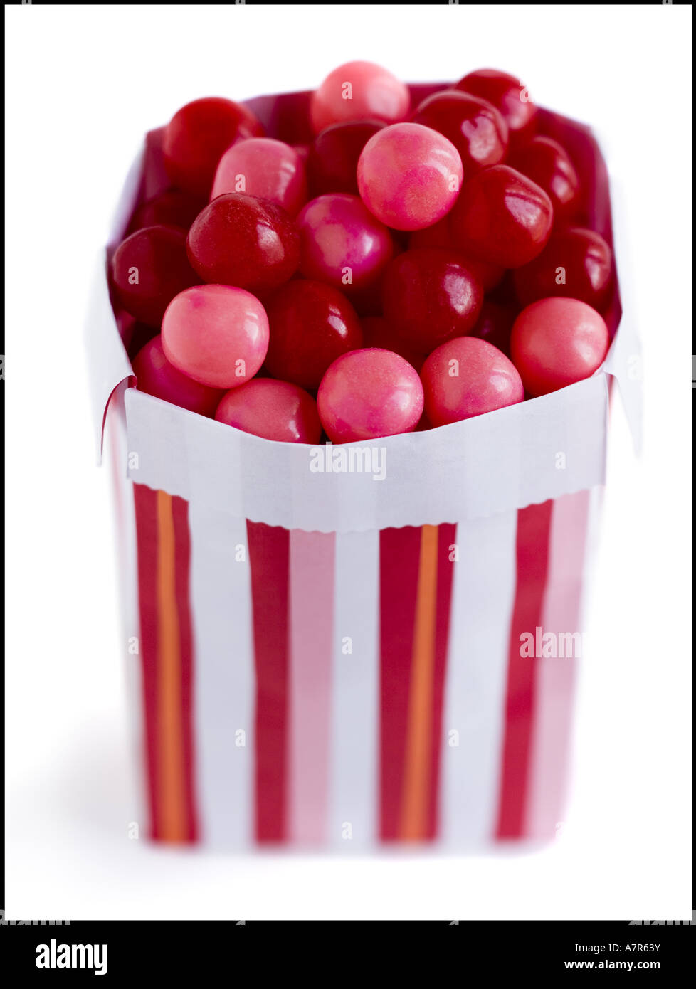 Candy box with pink and red candies Stock Photo - Alamy