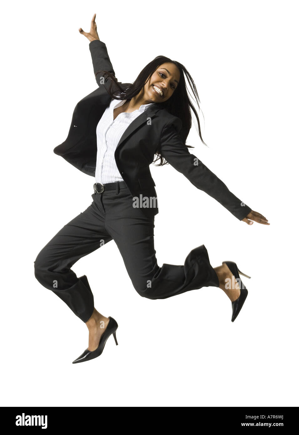 Woman smiling and dancing Stock Photo - Alamy
