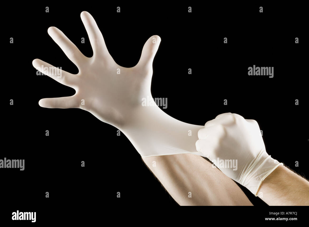 Hands man in medical rubber hi-res stock photography and images - Alamy