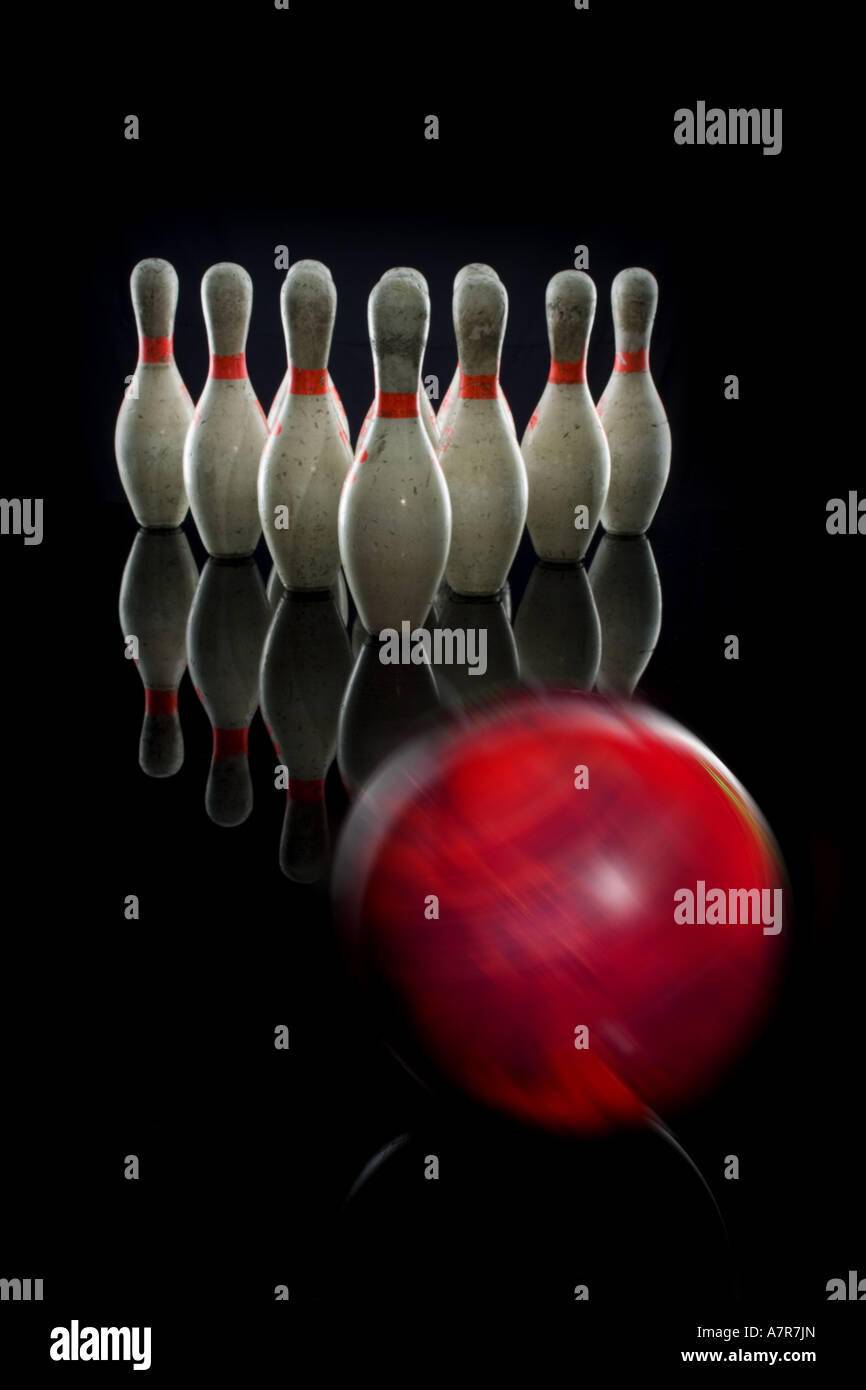 Bowling pins and bowling ball in motion Stock Photo - Alamy