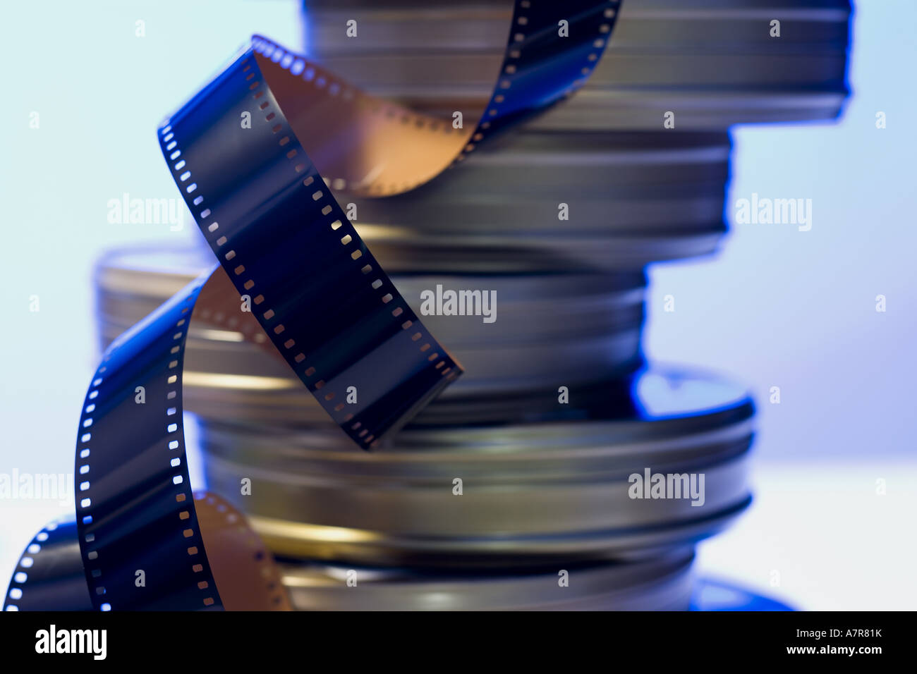 Coiled film strip and canisters Stock Photo - Alamy