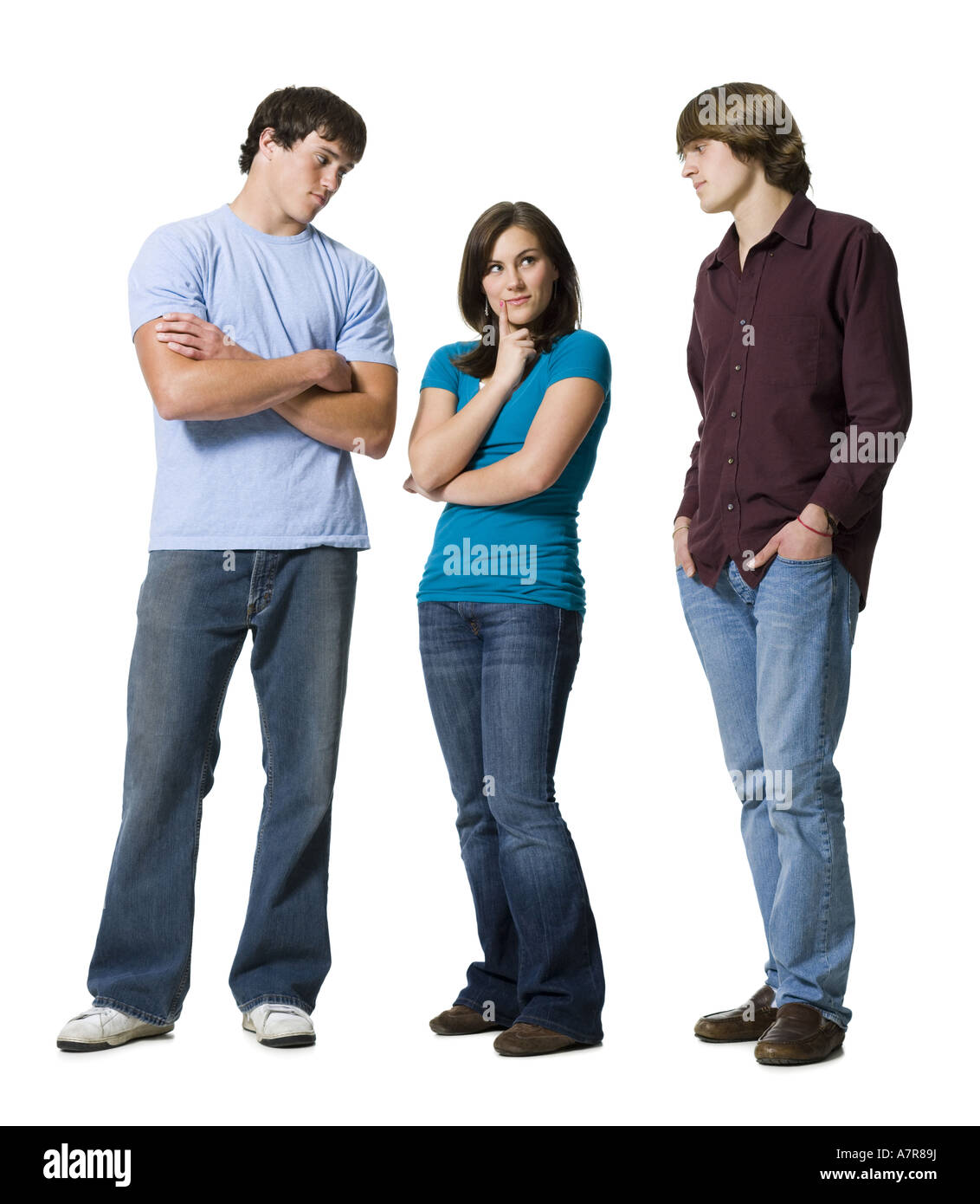 Two boys and girl deciding Stock Photo - Alamy