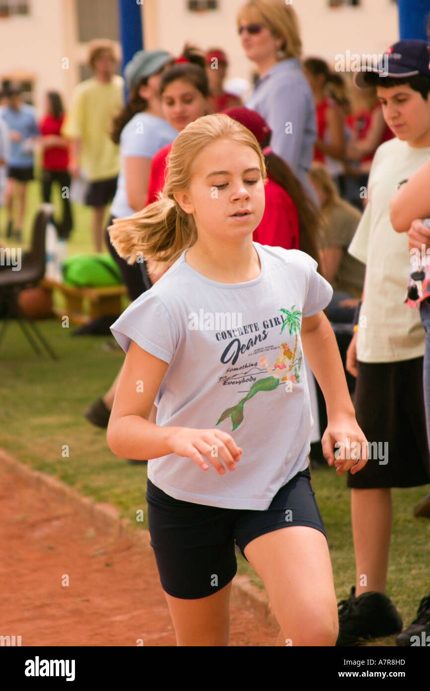 school girl running on sports day Stock Photo - Alamy