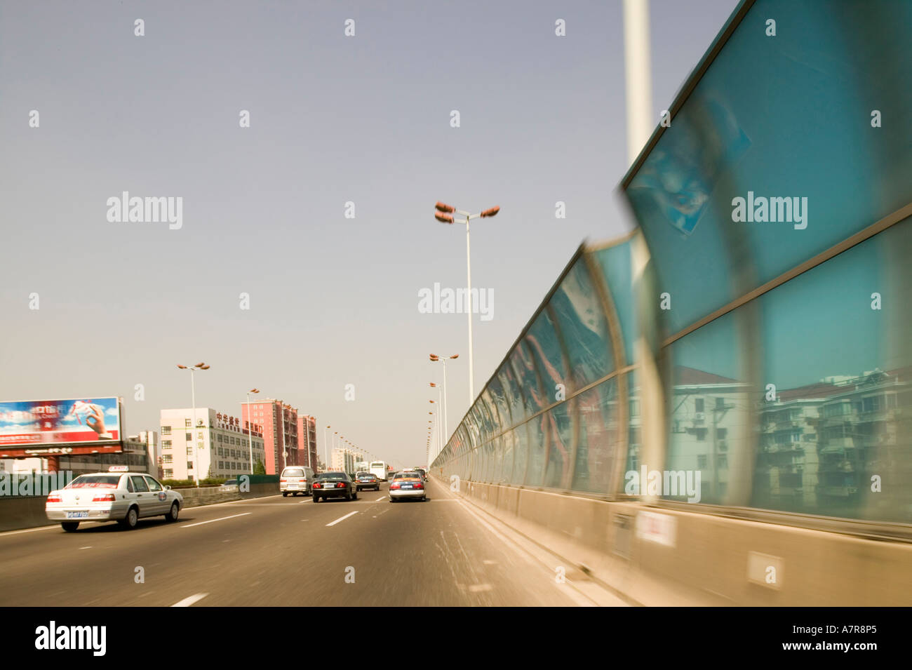 Asia China Shanghai View through taxi window driving through morning ...