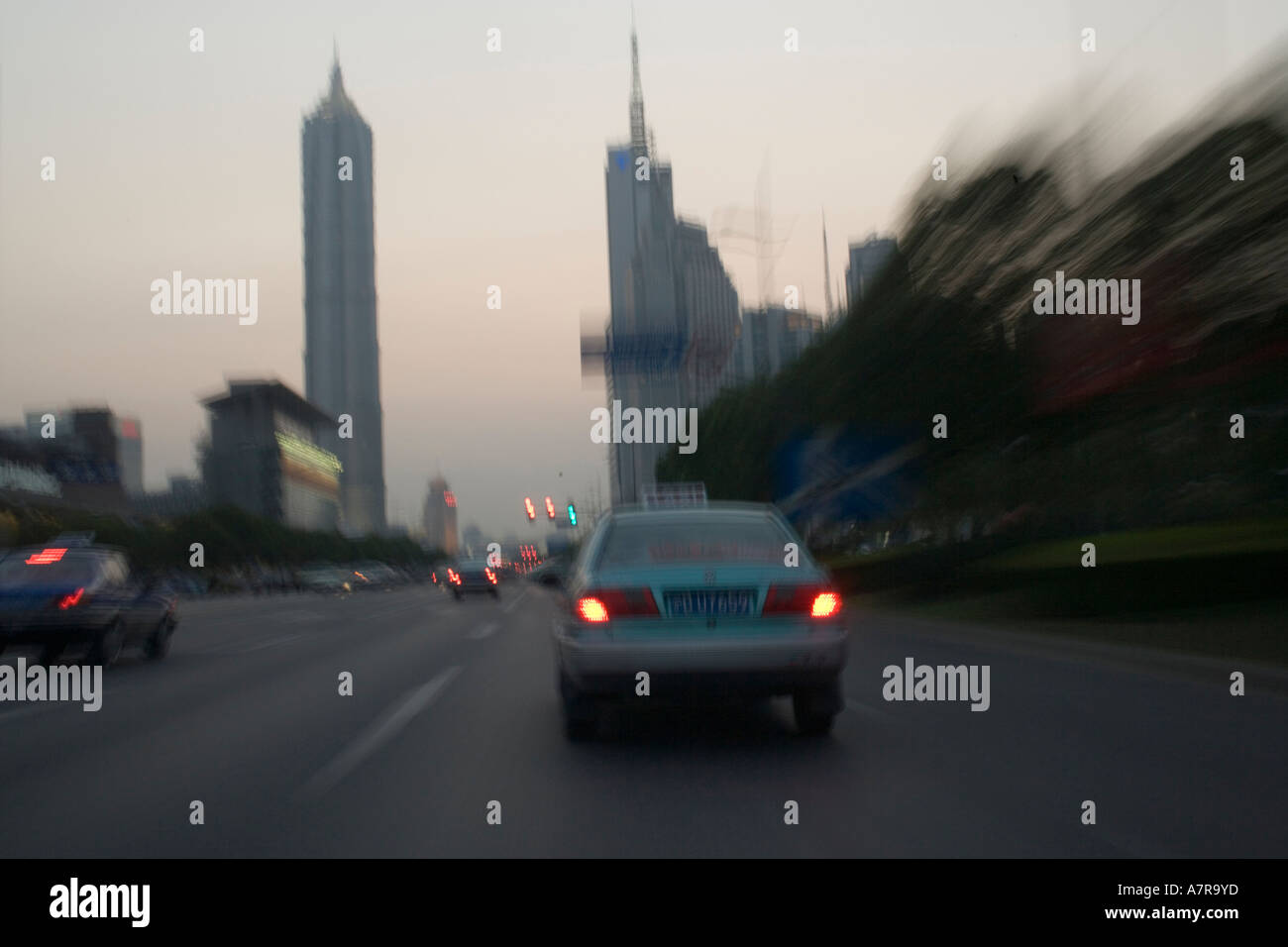 Asia China Shanghai View through taxi cab window of evening rush hour ...