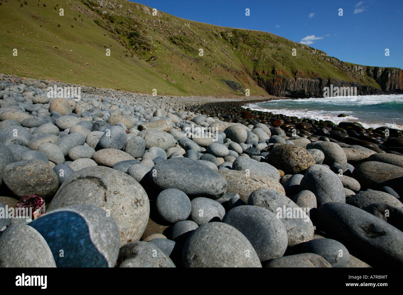A boulder strewn beach on the Transkei coast at the Hole in the Wall ...