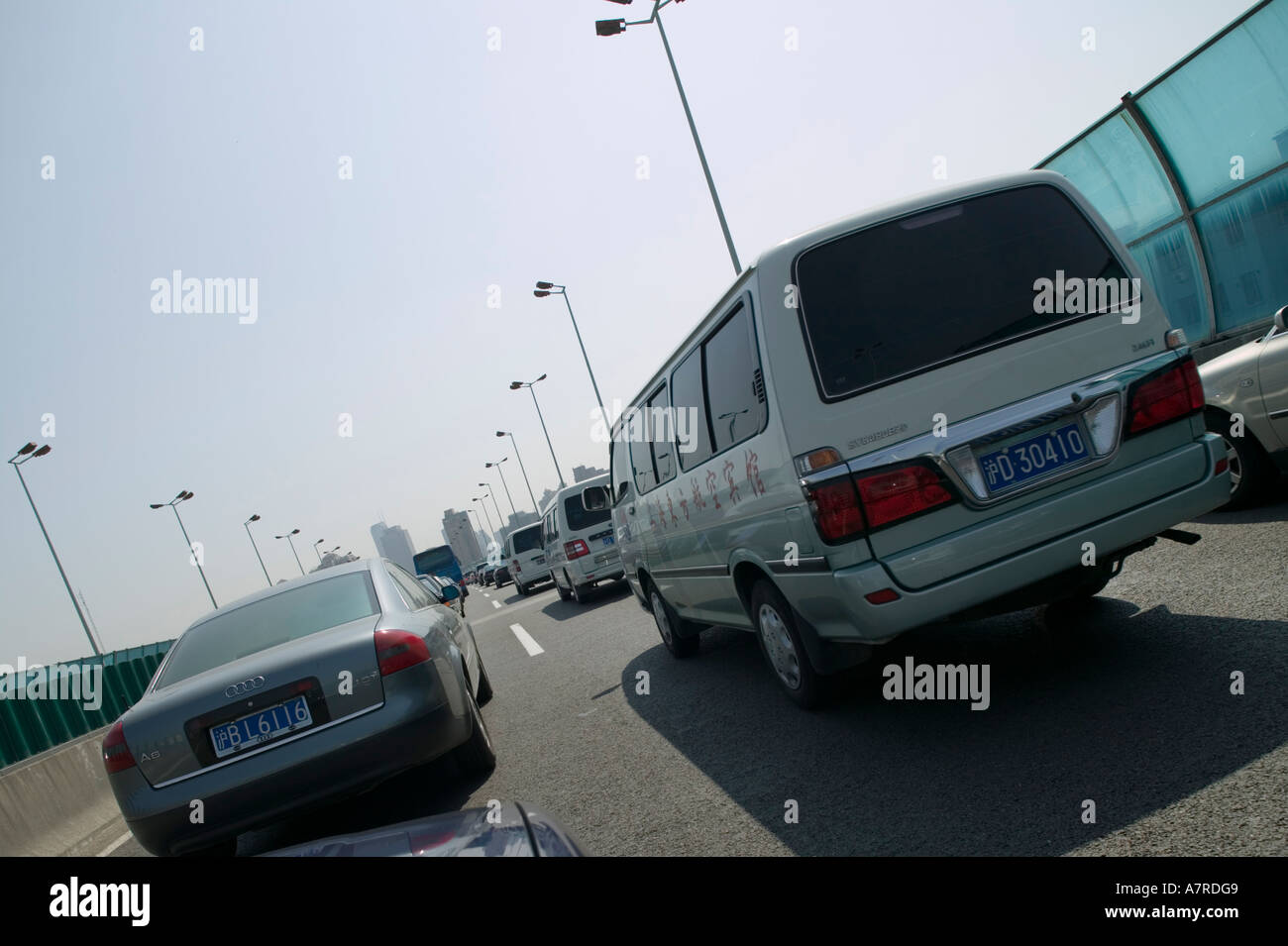Asia China Shanghai View through taxi window driving through morning ...