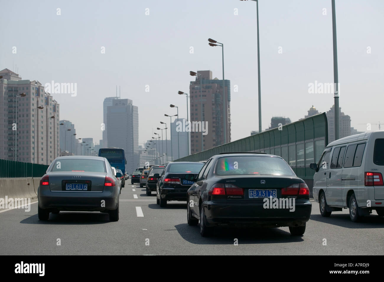 Asia China Shanghai View through taxi window driving through morning ...